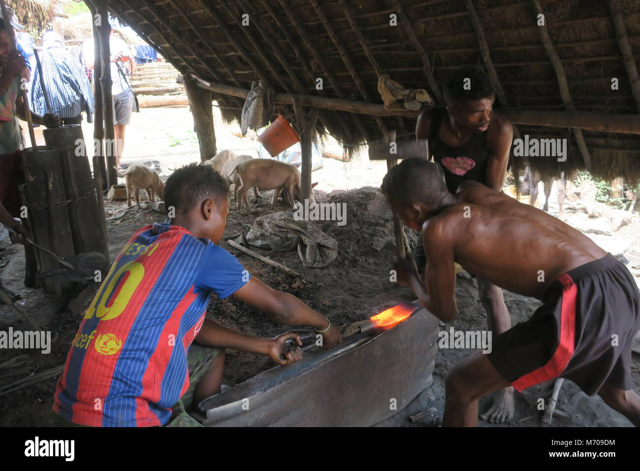 At iron factory, Madagascar. Handmaded garden spade Stock Photo - Alamy