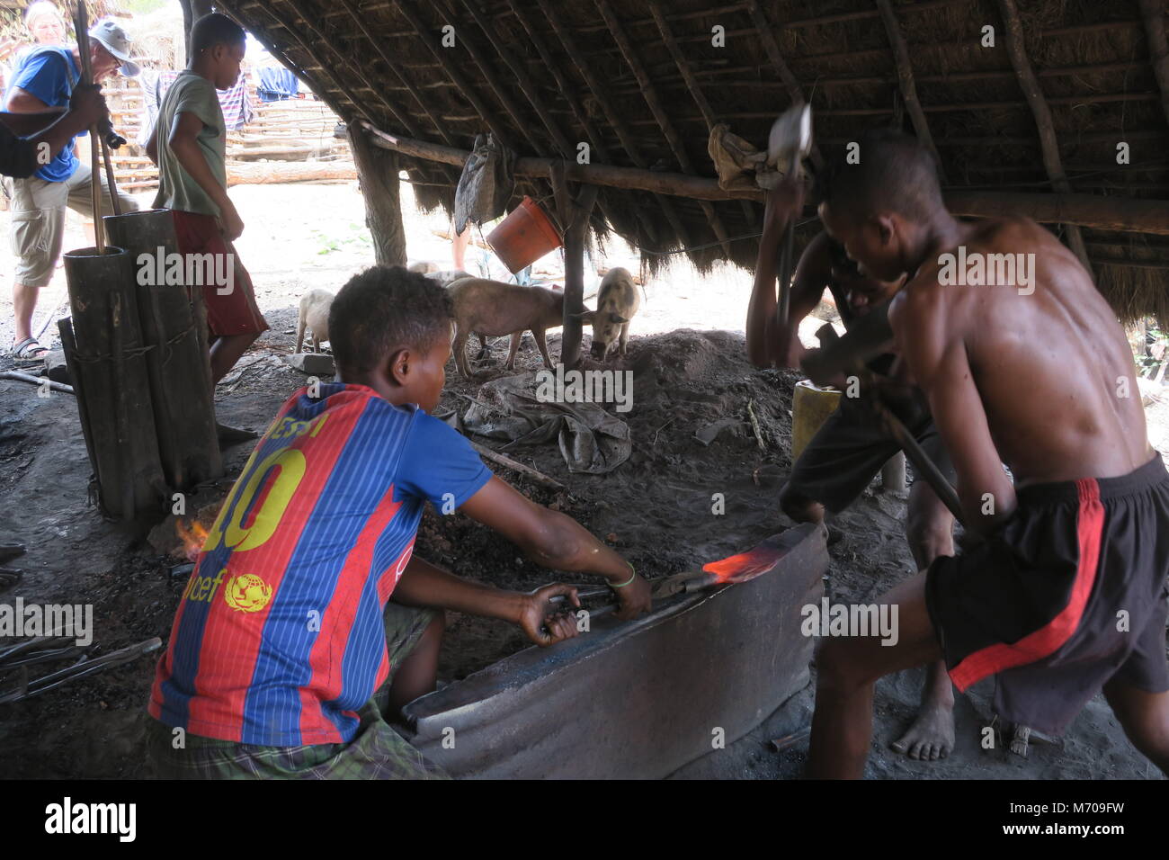 At iron factory, Madagascar. Handmaded garden spade Stock Photo - Alamy