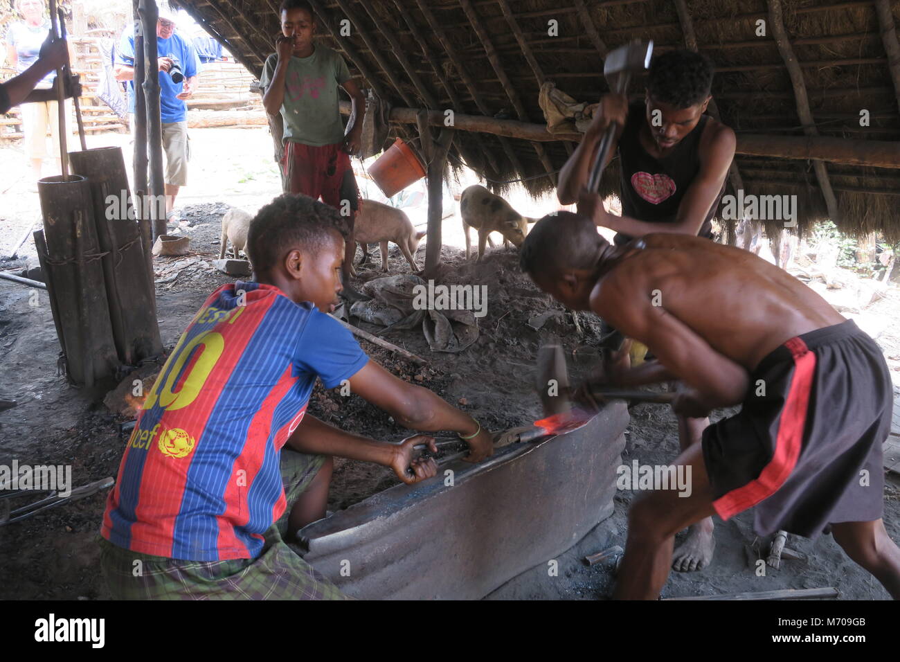At iron factory, Madagascar. Handmaded garden spade Stock Photo - Alamy