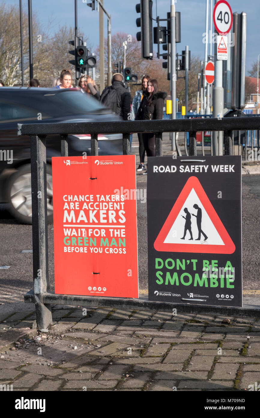 Don't be a smombie, road safety warning signs at busy pedestrian ...