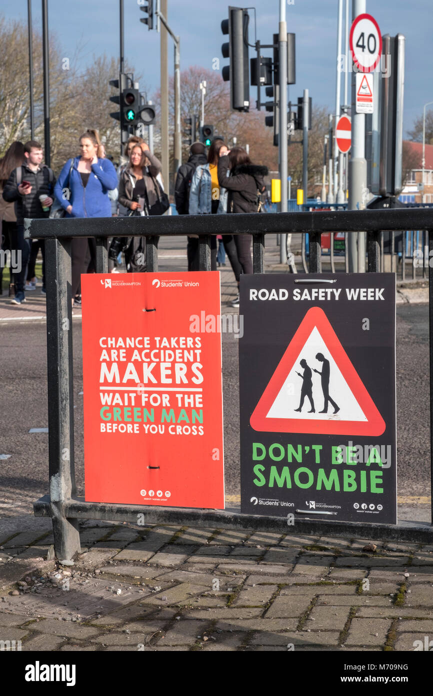 Don't be a smombie, road safety warning signs at busy pedestrian ...