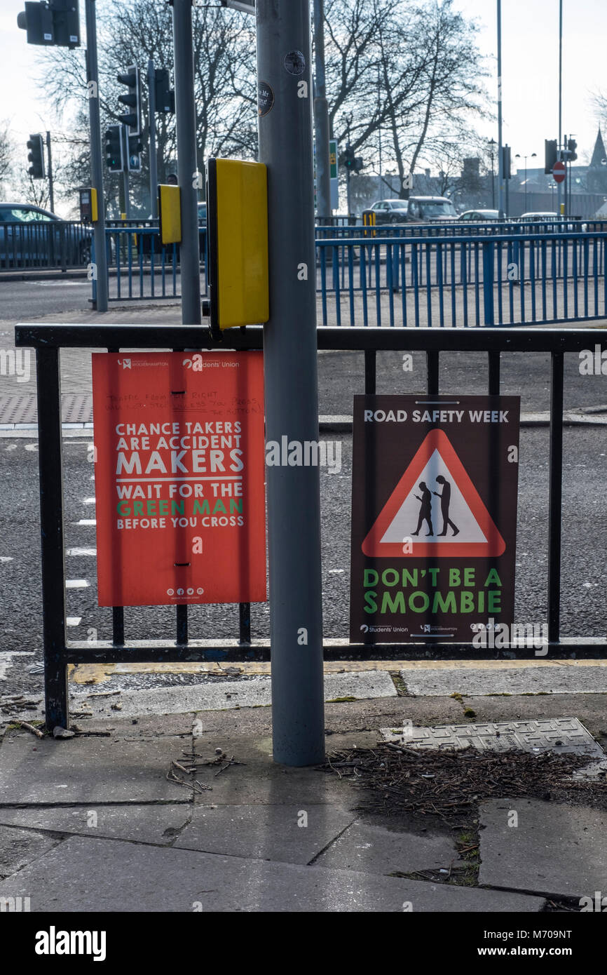 Don't be a smombie, road safety warning signs at busy pedestrian ...
