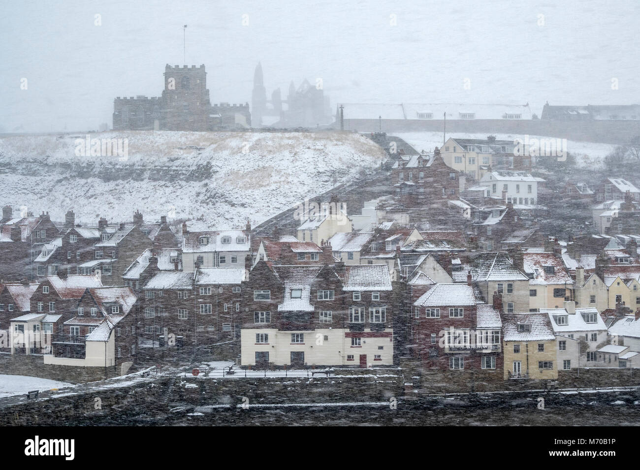 Whitby In Winter with Snow Fall, North Yorkshire Stock Photo - Alamy
