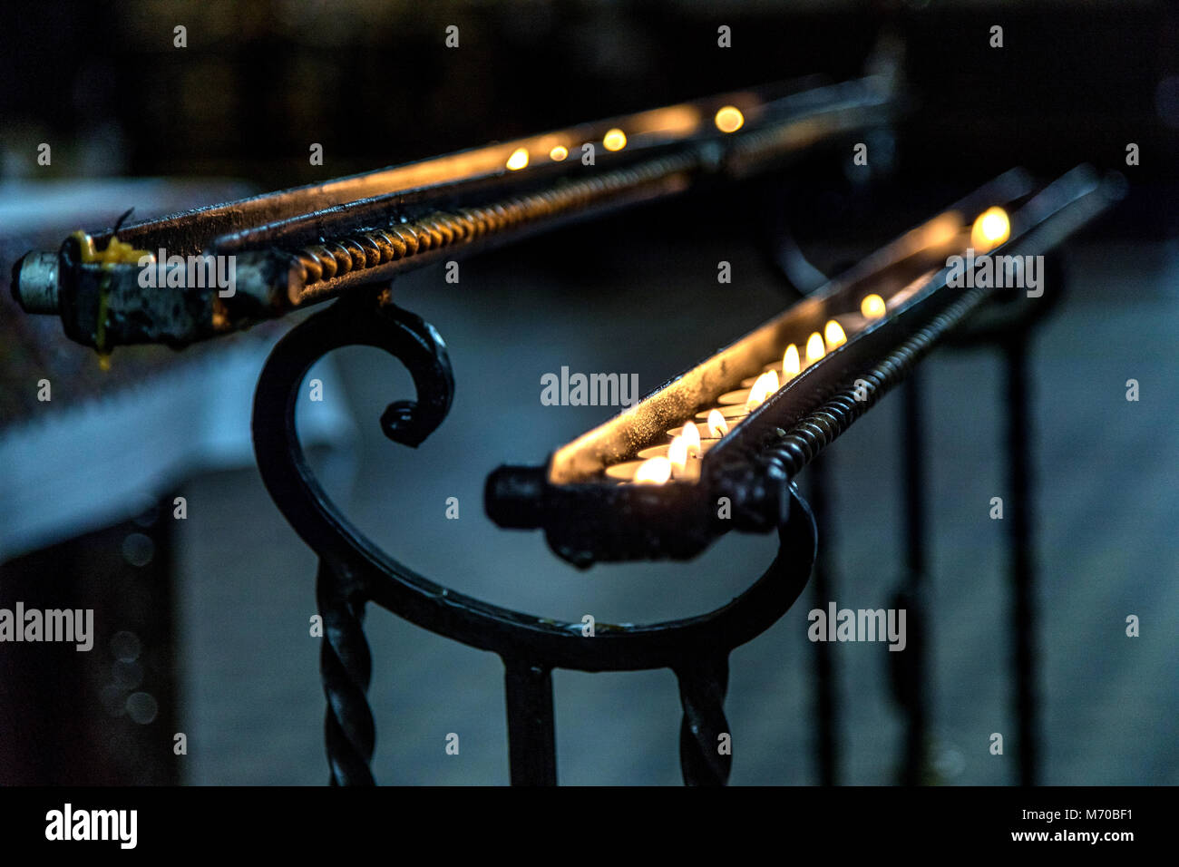 Background with red lights and candles in the church Stock Photo - Alamy