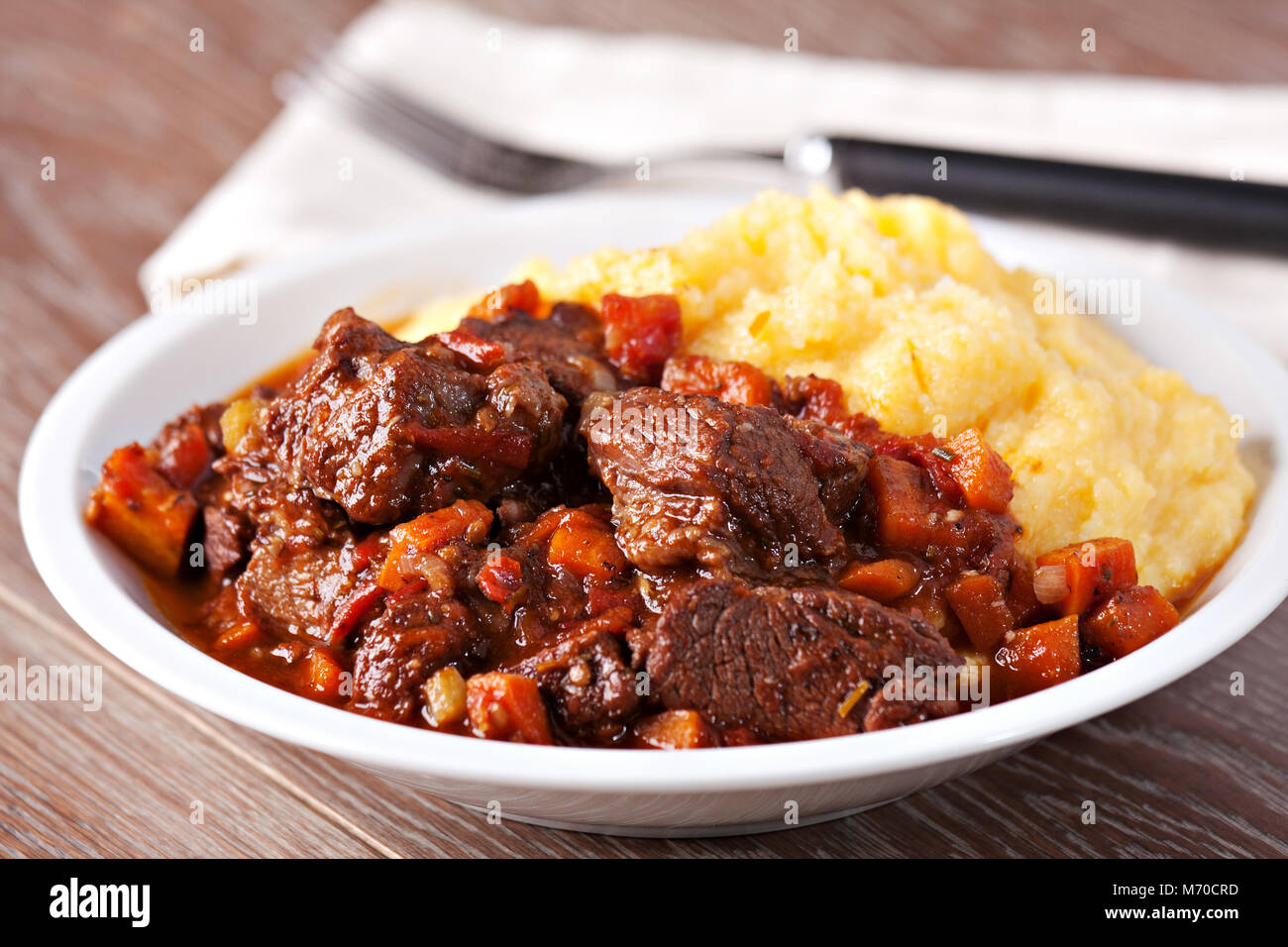 Polenta and stew Stock Photo - Alamy