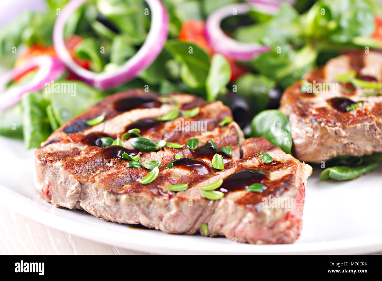 Fillet of beef with salad Stock Photo - Alamy