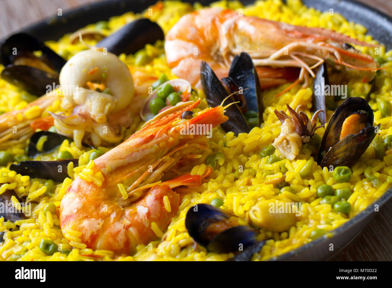Dish fish sauce yellow spain hi-res stock photography and images - Alamy