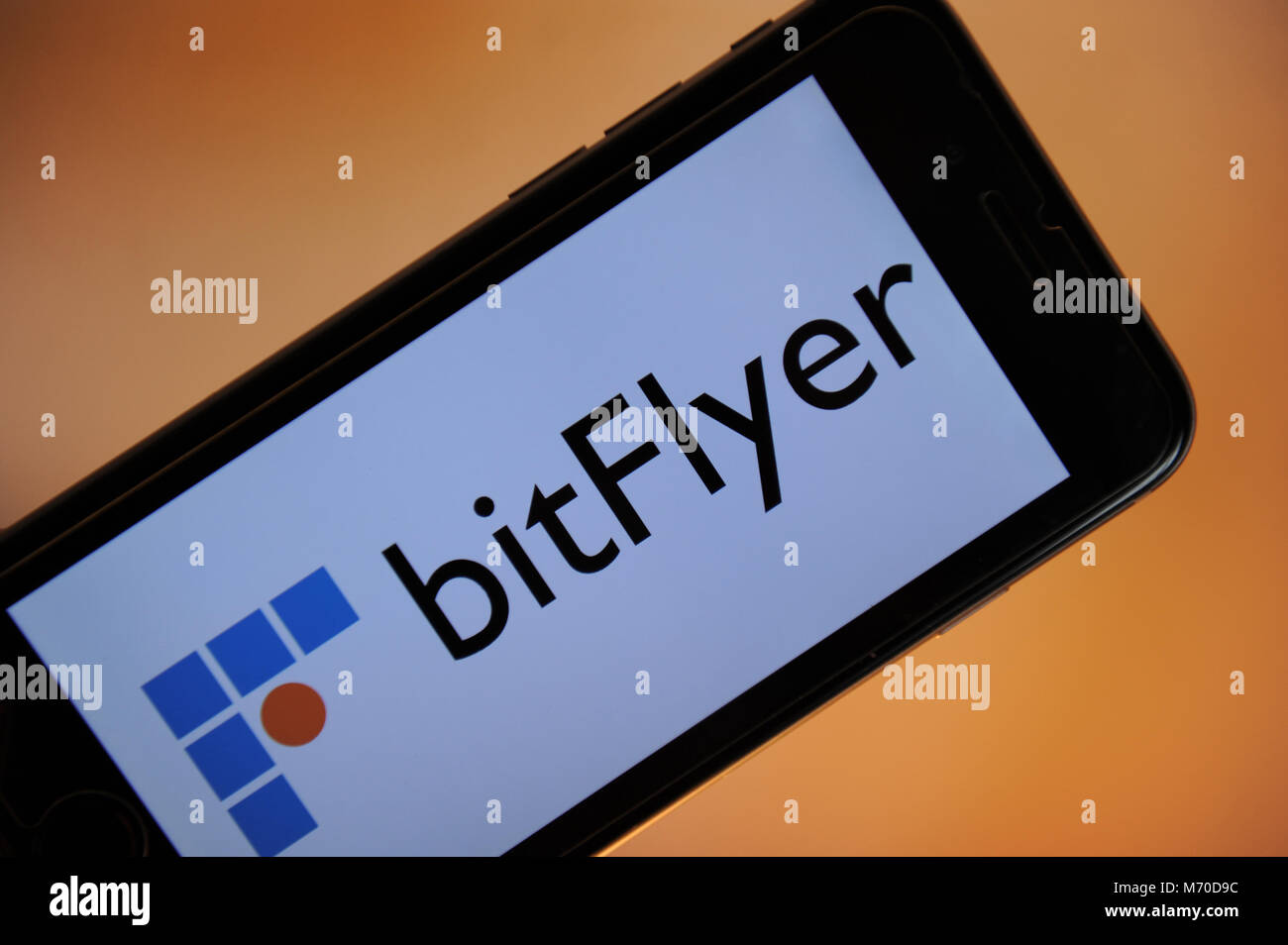 The BitFlyer logo on a phone screen Stock Photo - Alamy