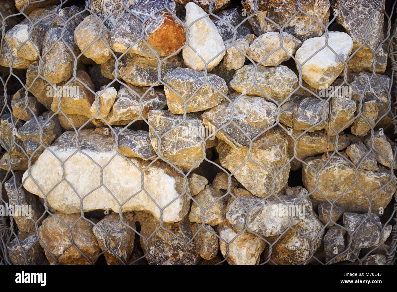 Grid with small stones of granite, background Stock Photo - Alamy