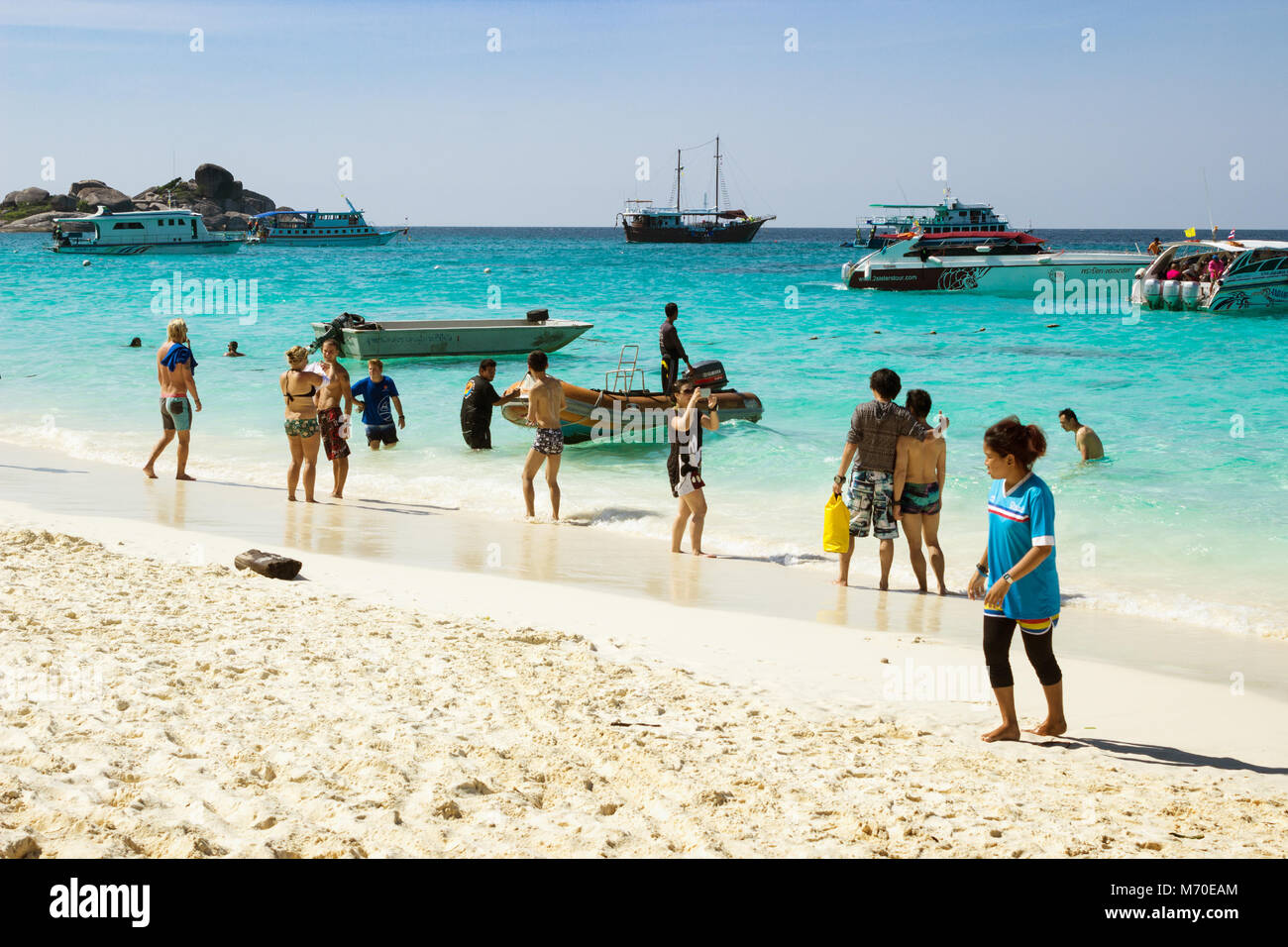 SIMILAN ISLANDS, THAILAND - FEB 27, 2015: People on the beach of one of ...