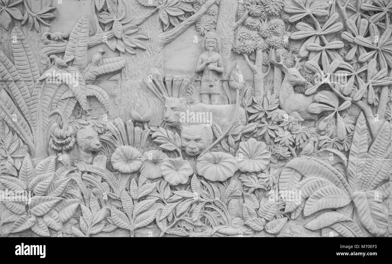 Concrete bas in traditional style on wall of fence, Thailand Stock ...