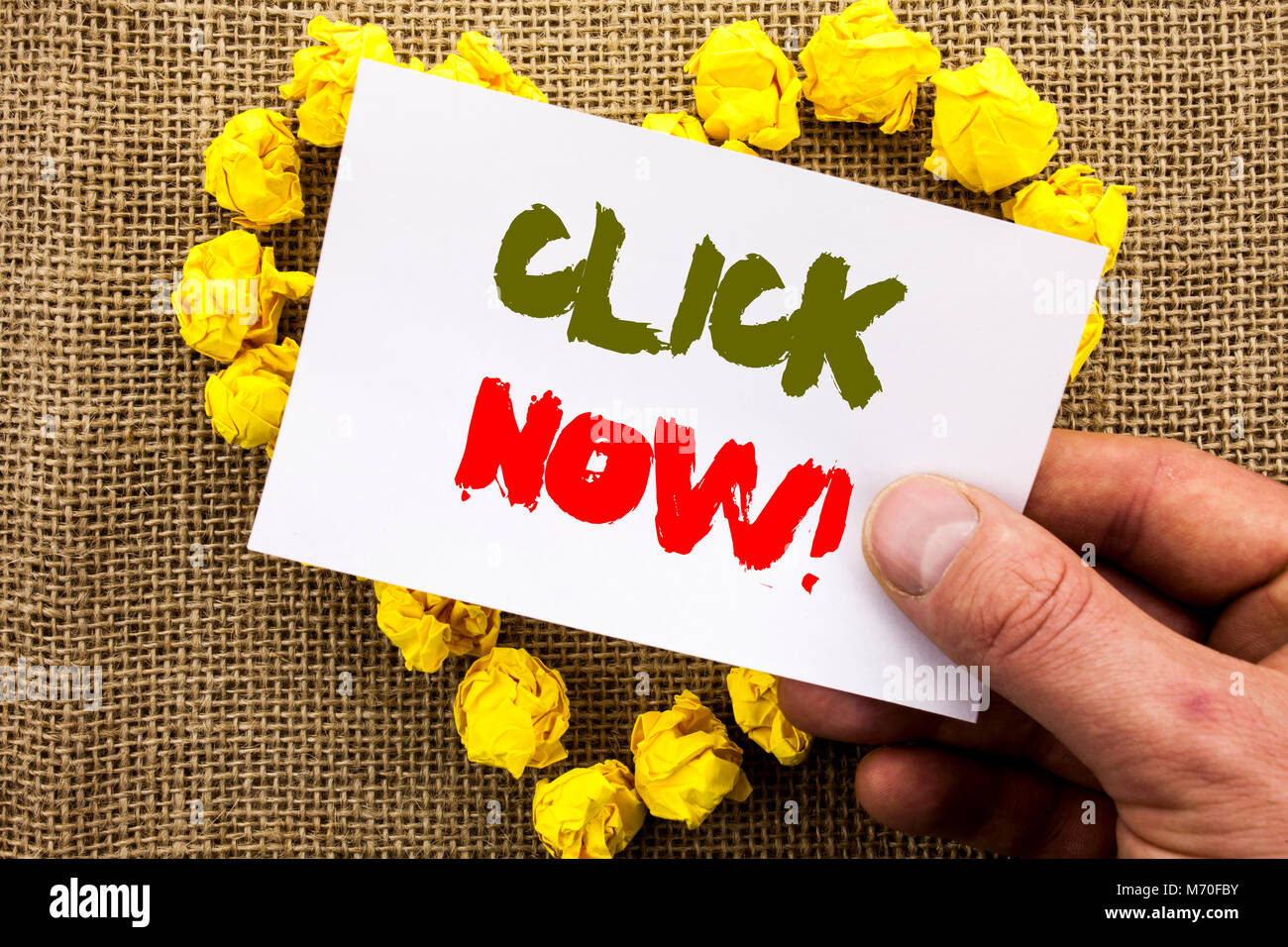 Handwritten text sign showing Click Now. Conceptual photo Sign Book Or ...