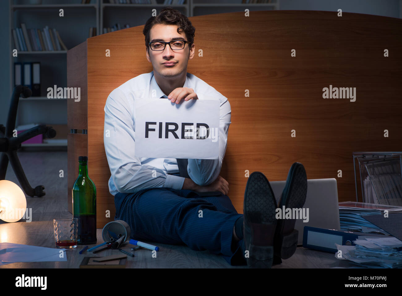 Employee fired during crisis drinking in stress and despair Stock Photo ...