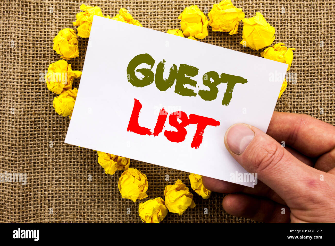 Handwritten text sign showing Guest List. Conceptual photo Planning ...