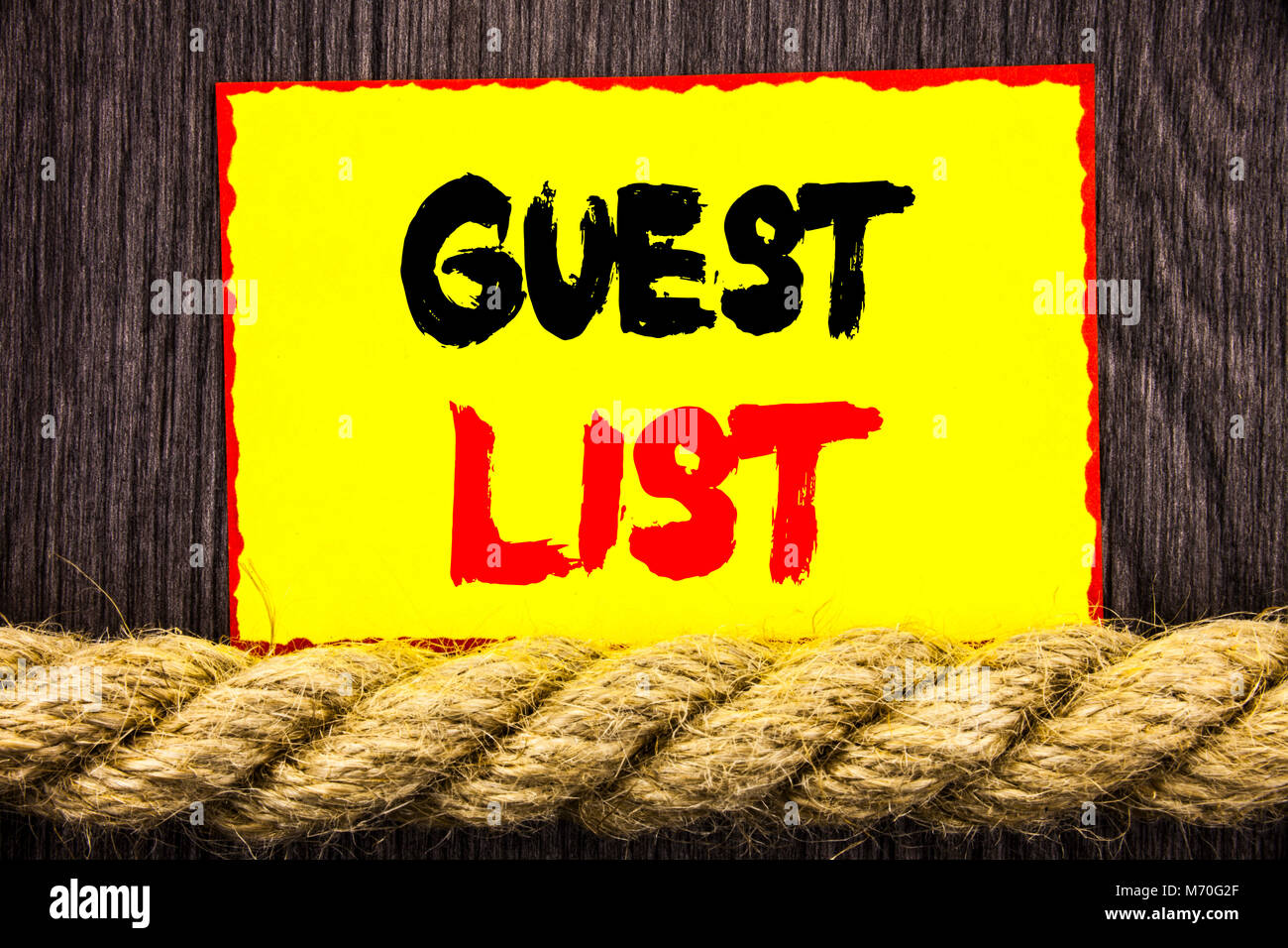 Handwritten text sign showing Guest List. Conceptual photo Planning ...