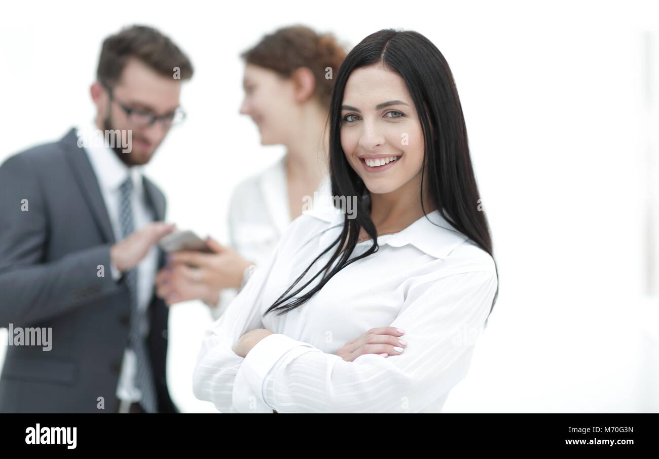 close-up of a beautiful woman manager and co-workers in the office ...