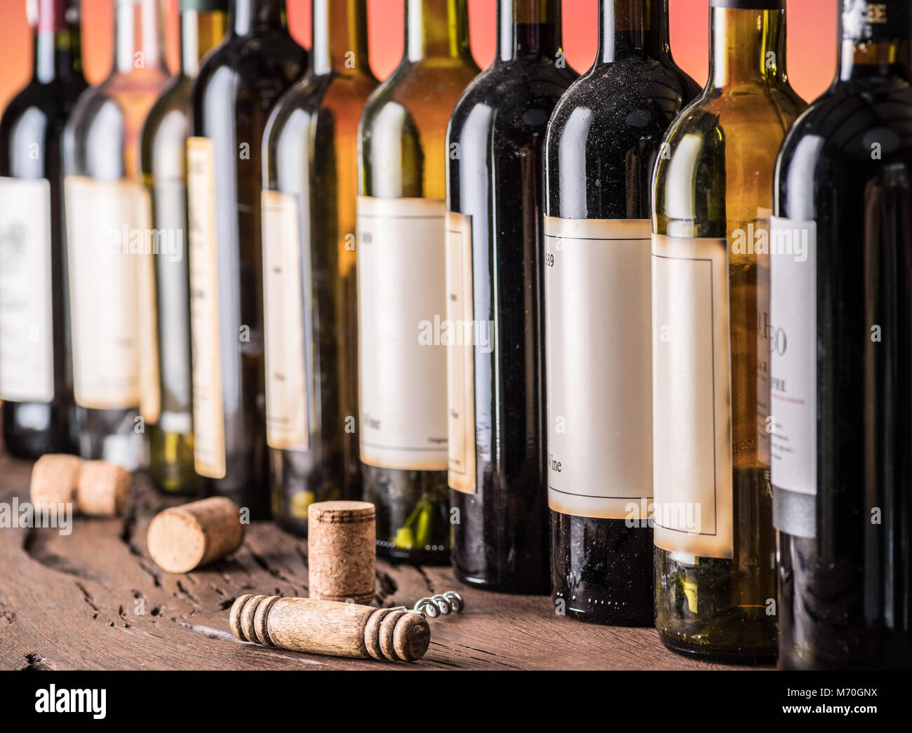 Line of wine bottles. Close-up Stock Photo - Alamy