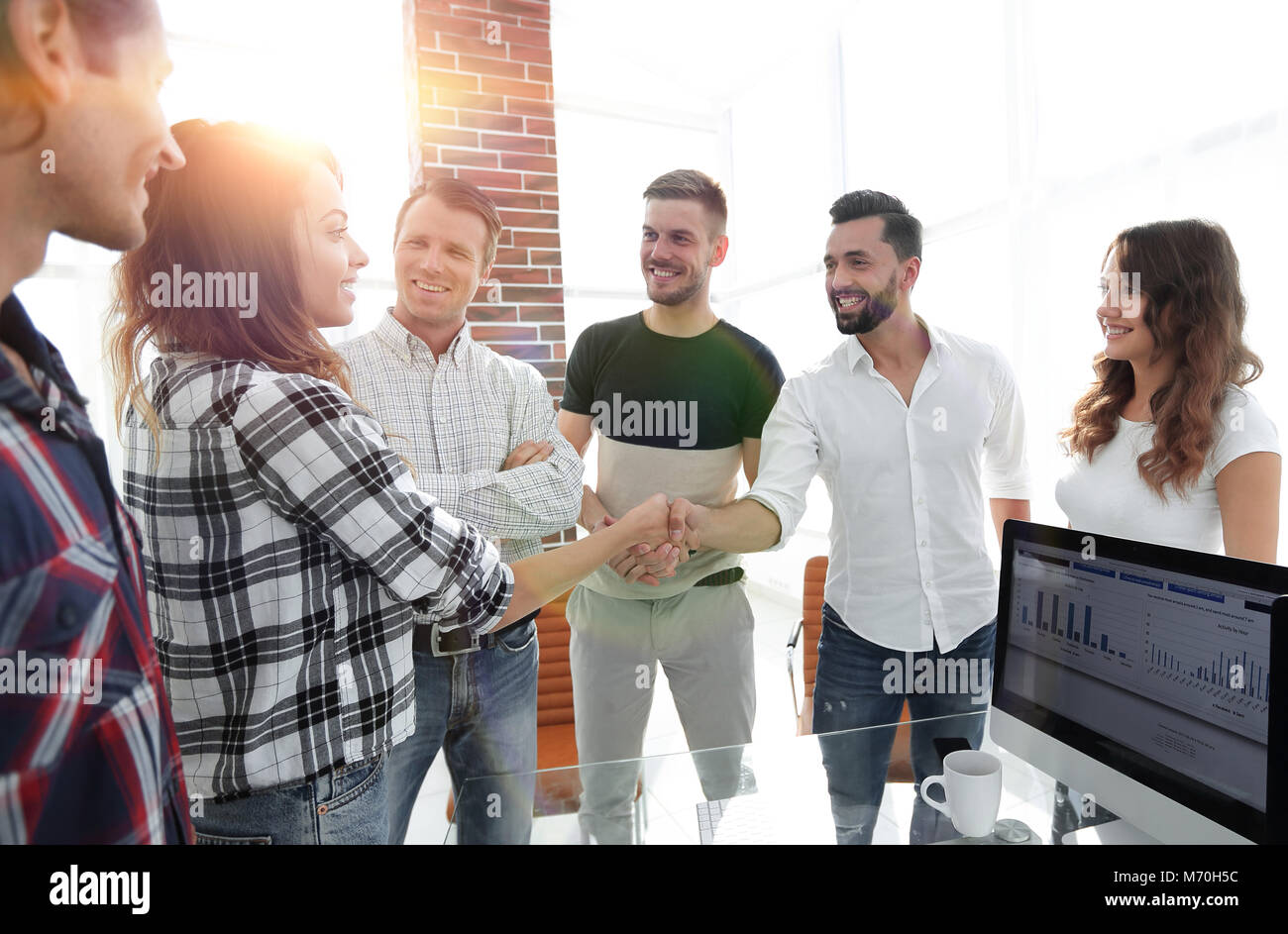 friendly handshake between Manager and employee Stock Photo - Alamy