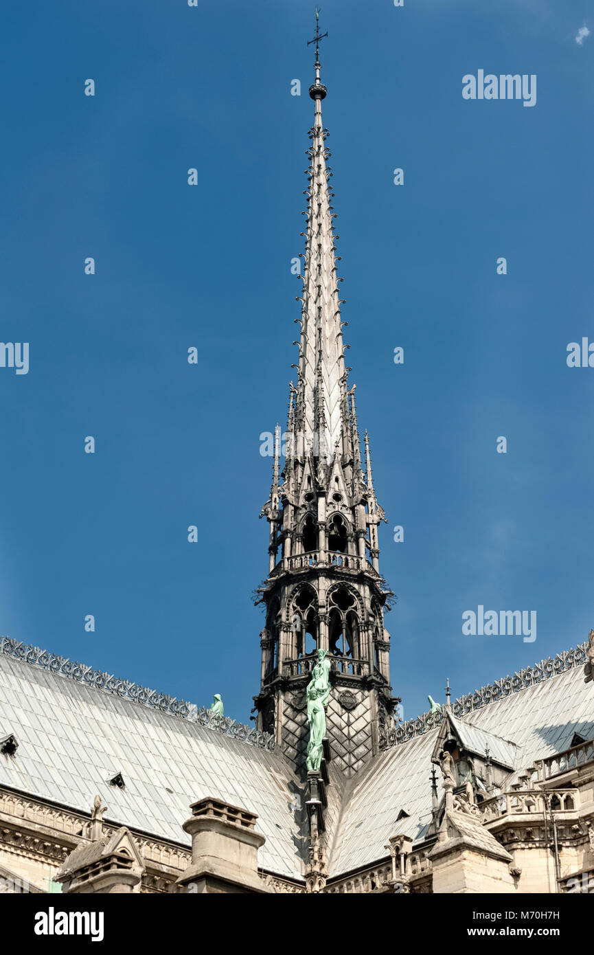 PARIS, FRANCE - MAY 06, 2011: The spire of the Notre-Dame Cathedral ...