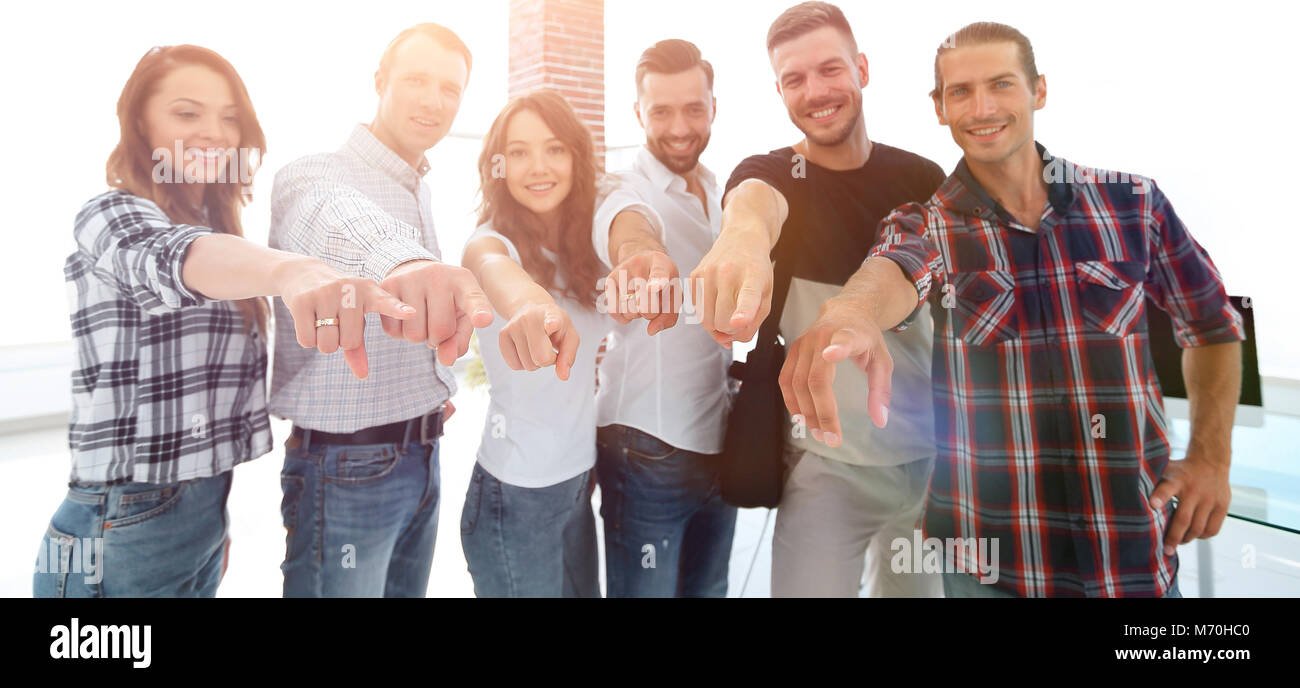 members of the business team pointing his arms forward Stock Photo - Alamy