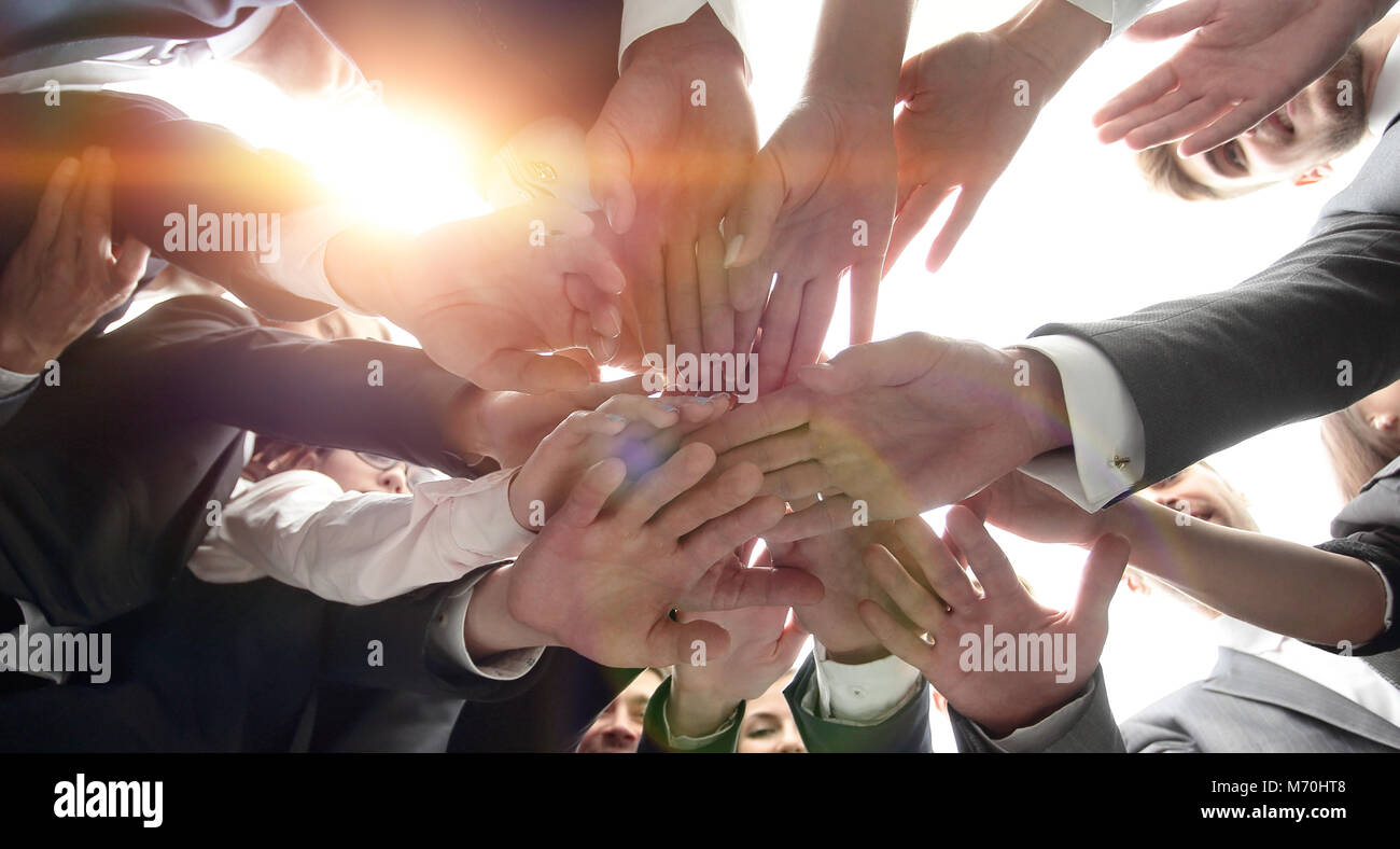 large business team is forming a circle and his hands clasped to Stock ...