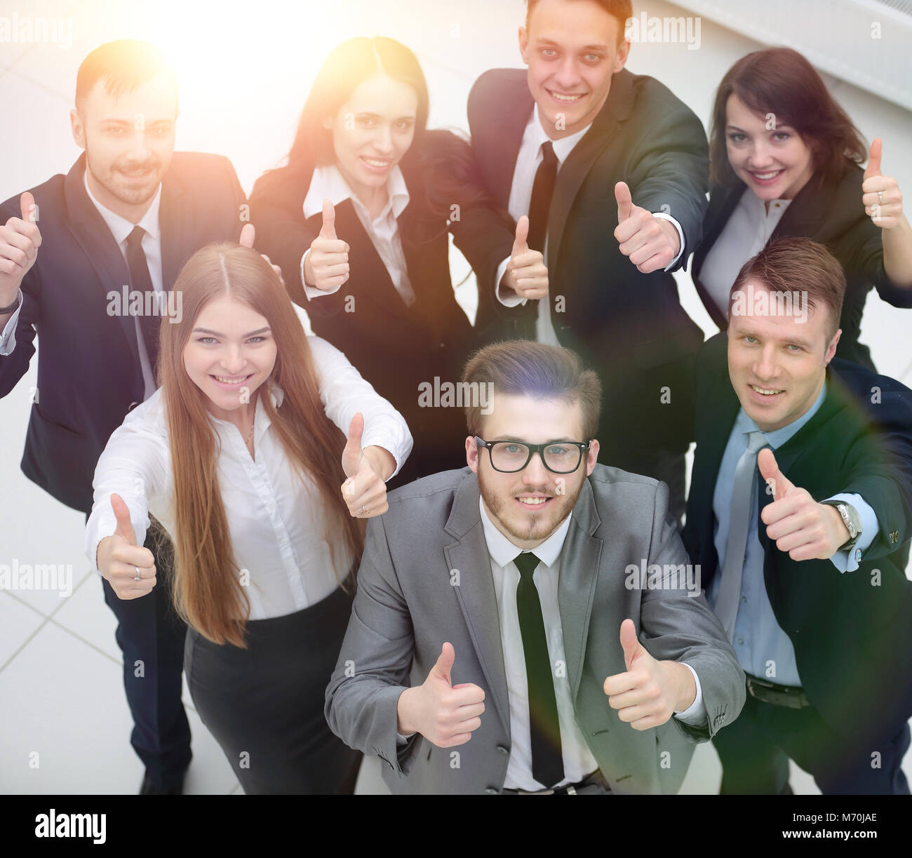 Portrait triumphant business team hi-res stock photography and images ...