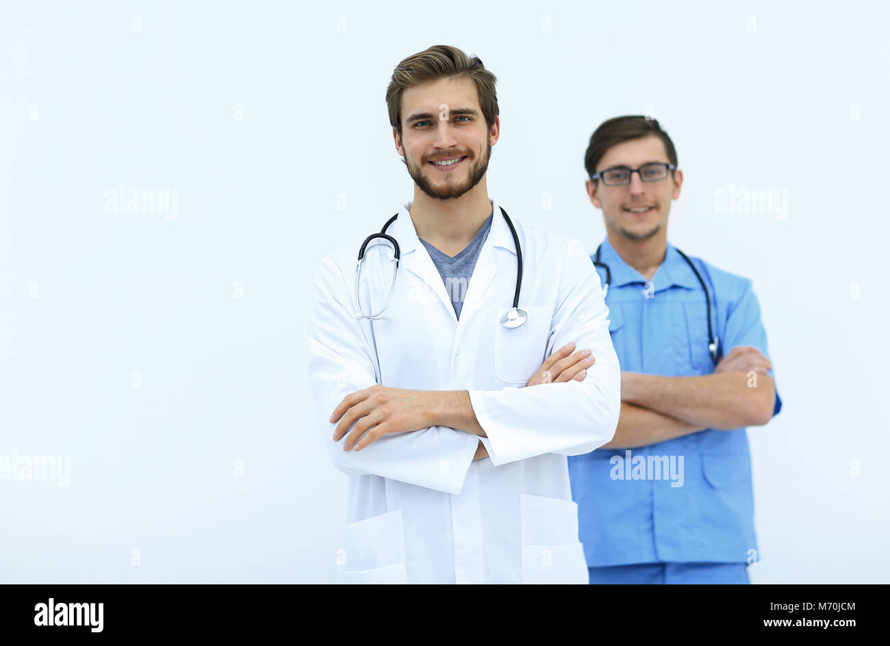 confident doctor and assistant .isolated on white Stock Photo - Alamy
