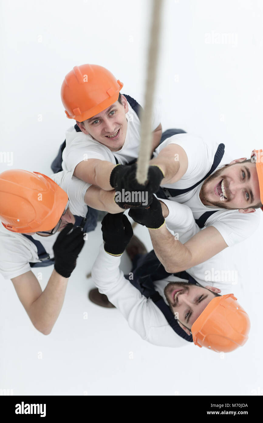 Construction worker pulling rope hi-res stock photography and images ...