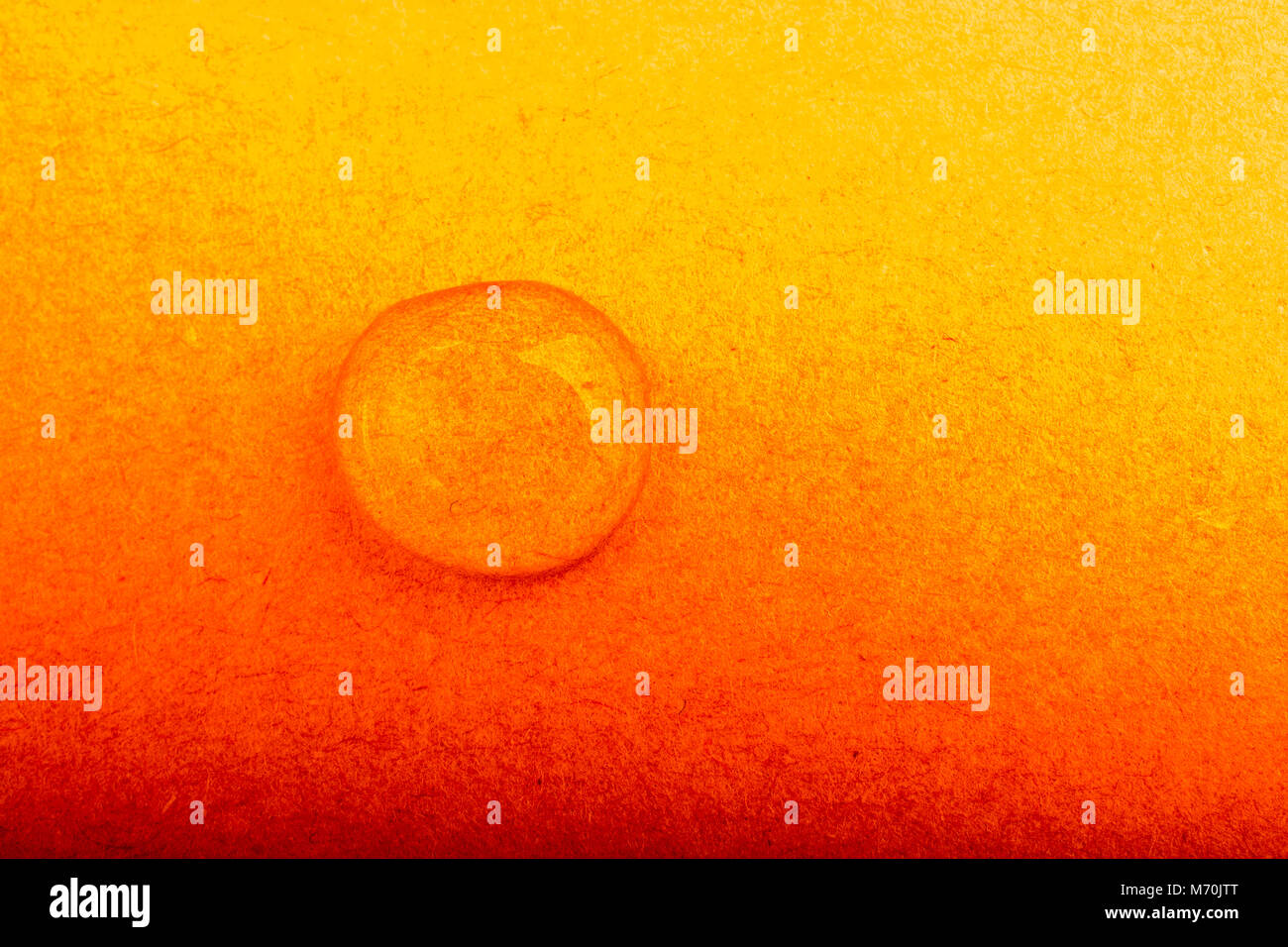 Round water drops in close-up view on colorful background Stock Photo ...