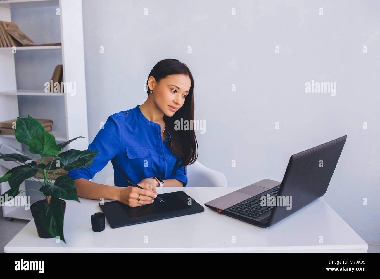 woman Graphic Designer at her working place Stock Photo - Alamy