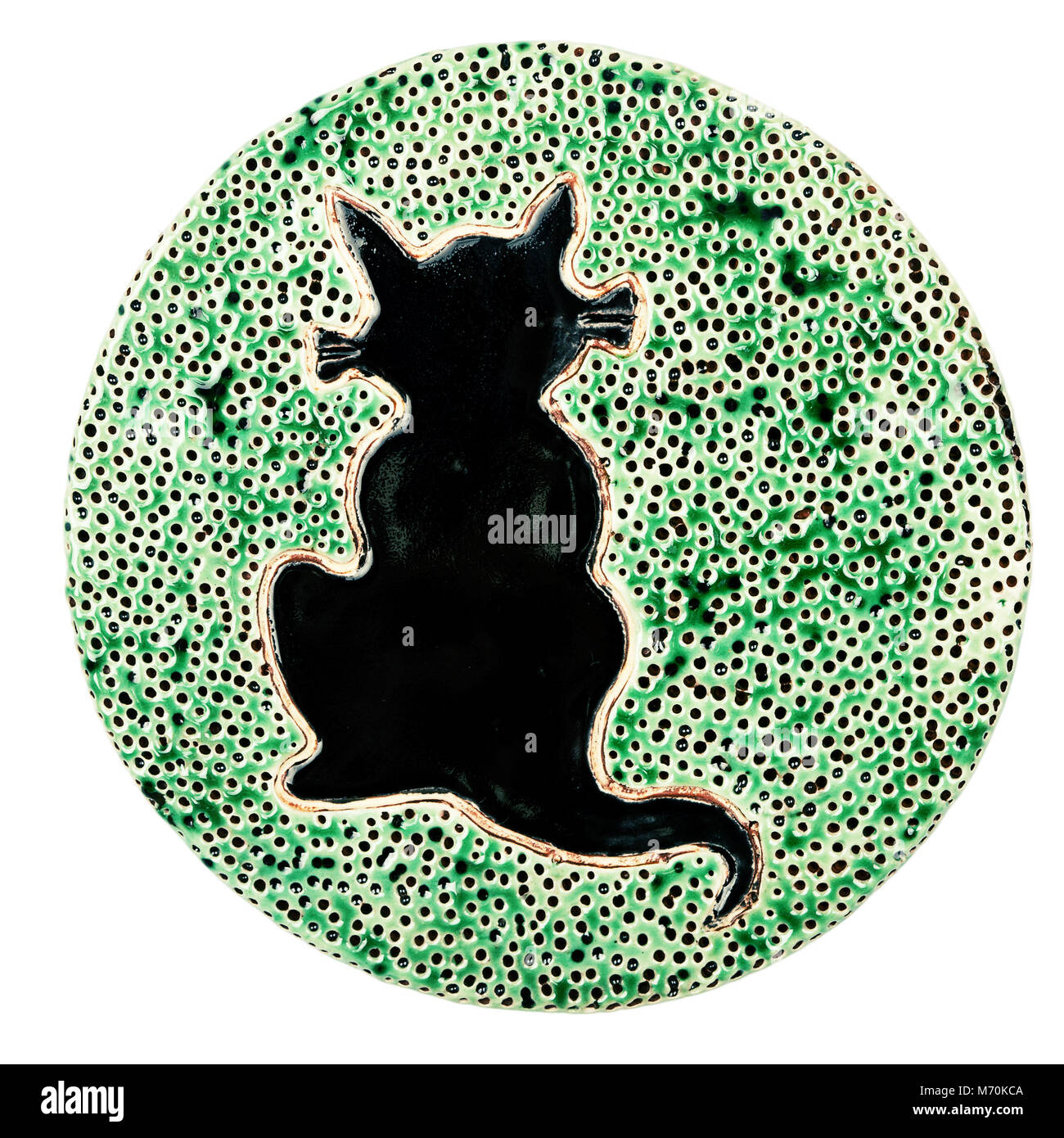 Handmade ceramic table coaster with an image of a cat Stock Photo - Alamy