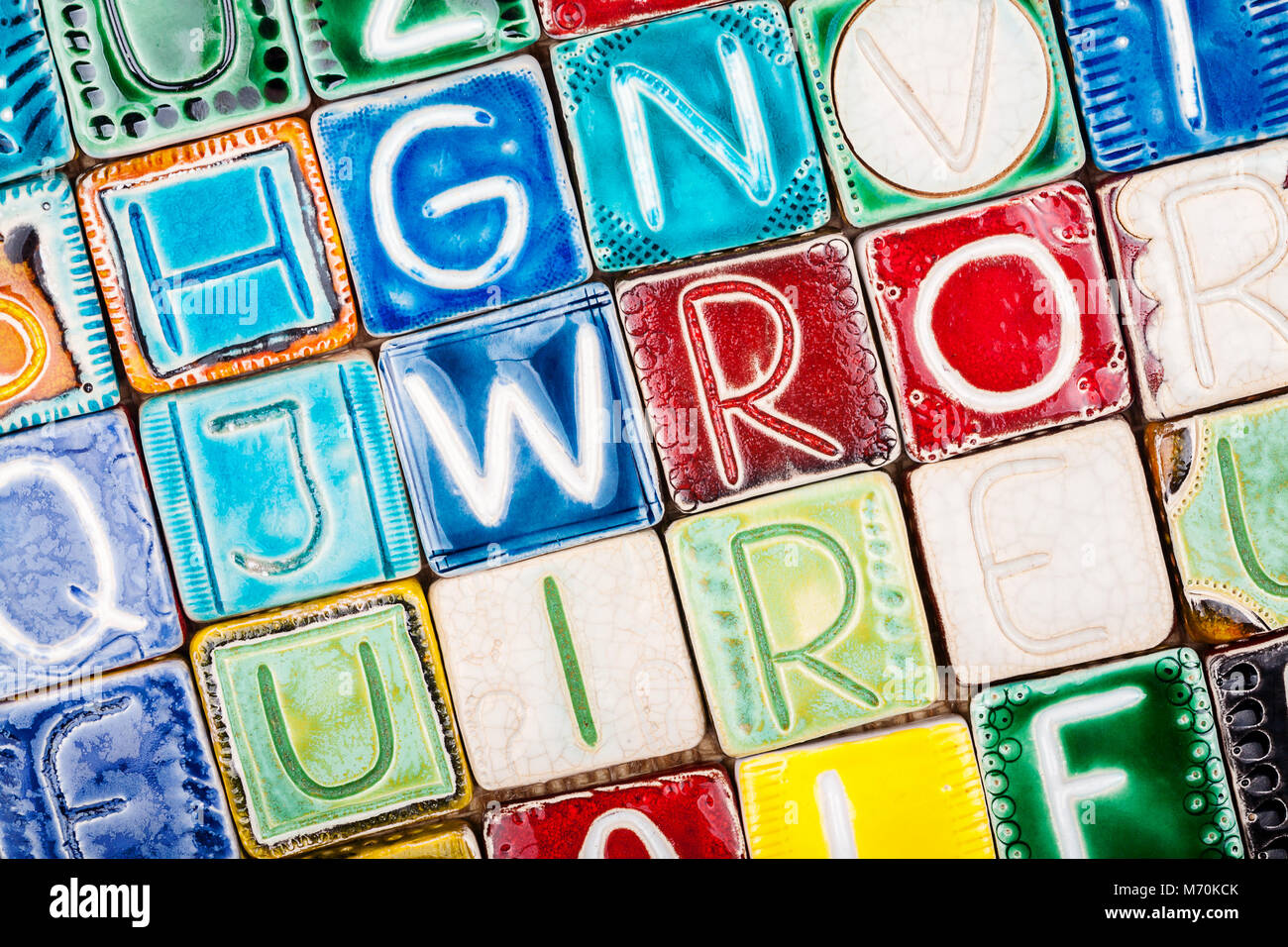 Background from colorful handmade ceramic letters Stock Photo - Alamy
