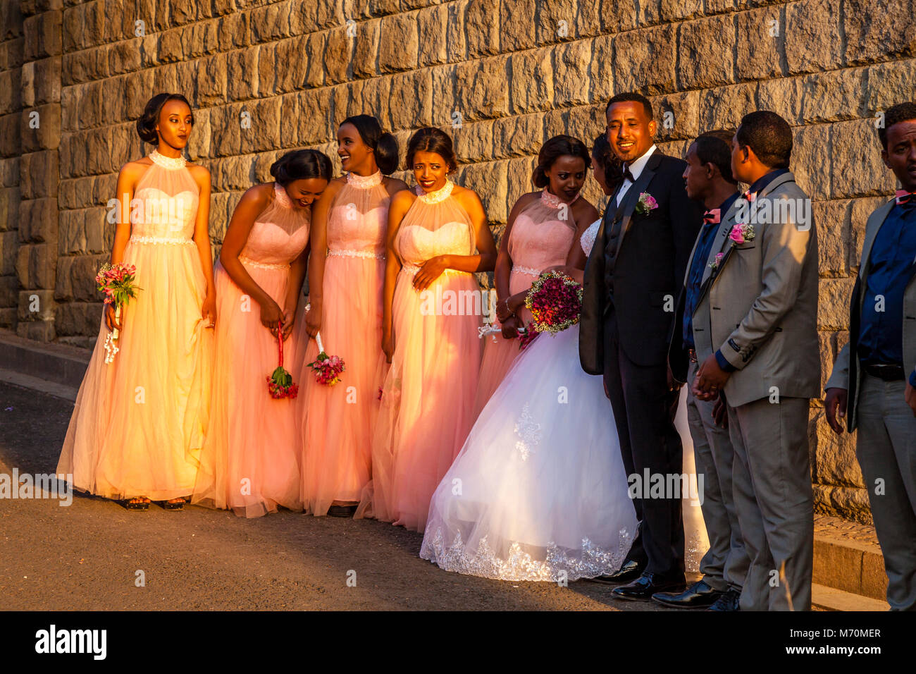 A Wedding Party Pose For Photographs Outside The Sheraton Hotel, Addis ...