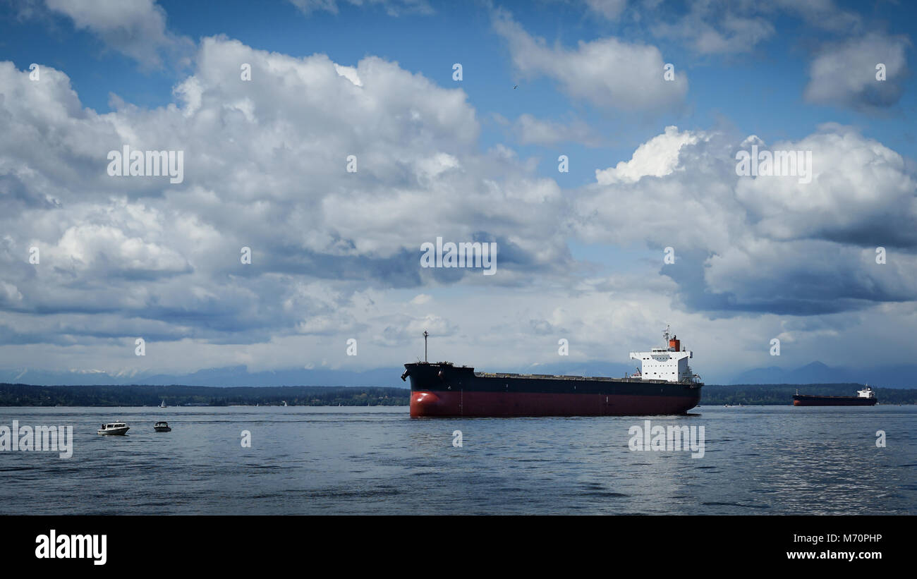Cargo container ship floating in sea bay washington Stock Photo - Alamy