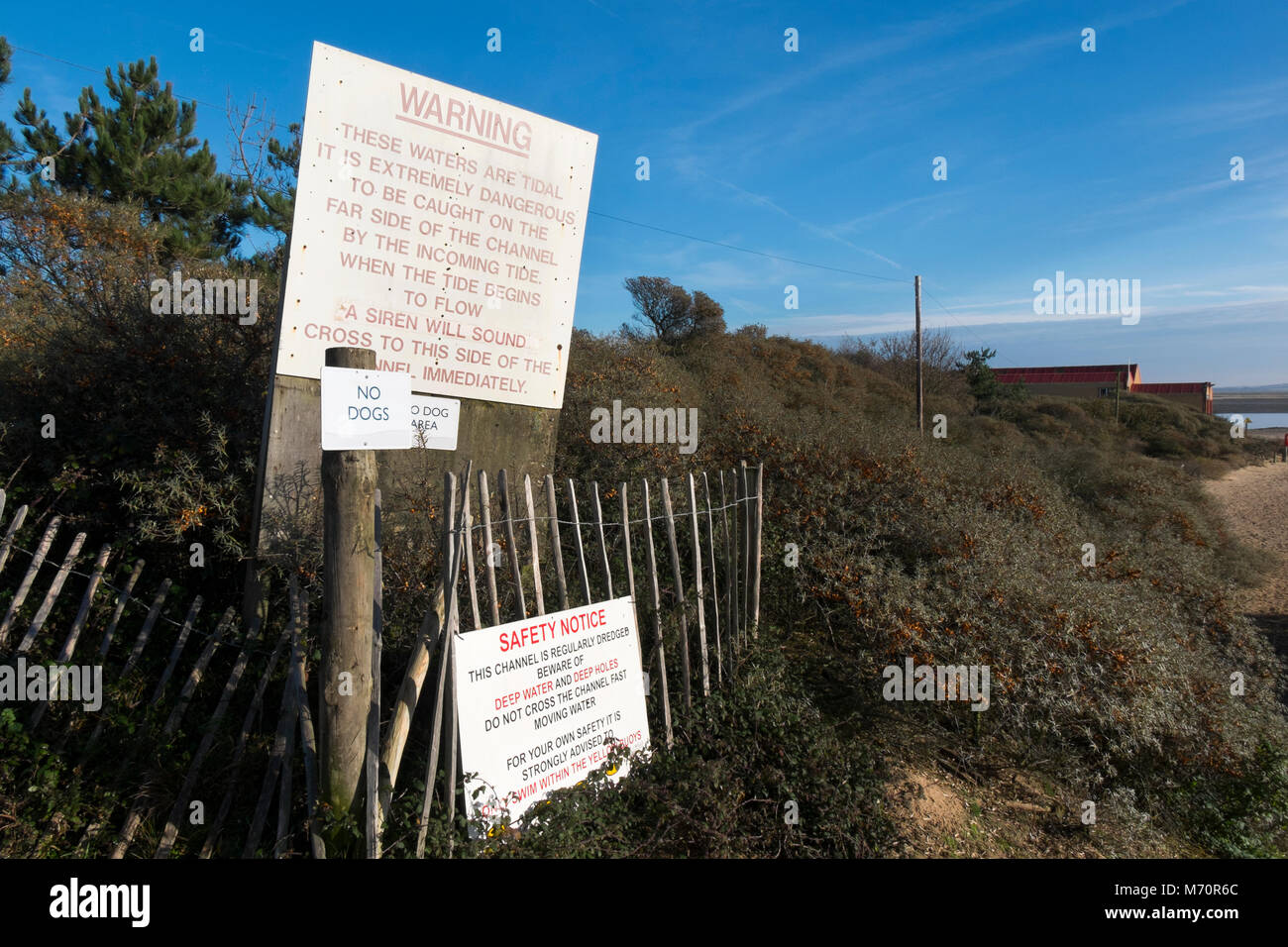 Warning sign about the dangerous waters at the beach at Wells-Next-The ...