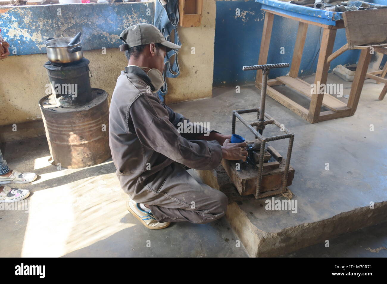Artisan at work in zebu horn craft workshop, Antsirabe, At horn factory ...
