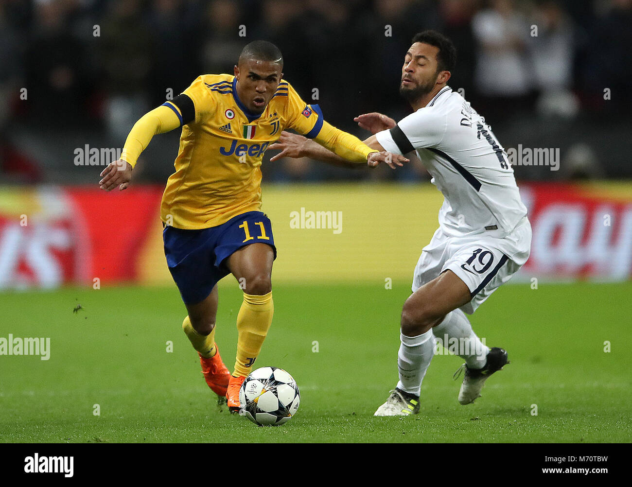 Juventus' de Souza Douglas Costa (left) and Tottenham Hotspur's Mousa ...