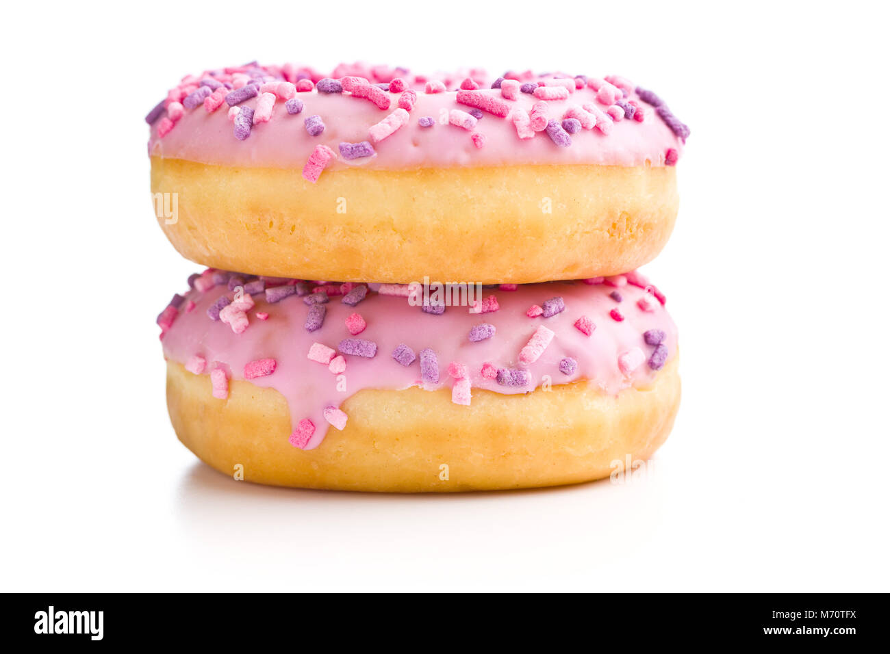 Two pink donuts isolated on white background Stock Photo - Alamy