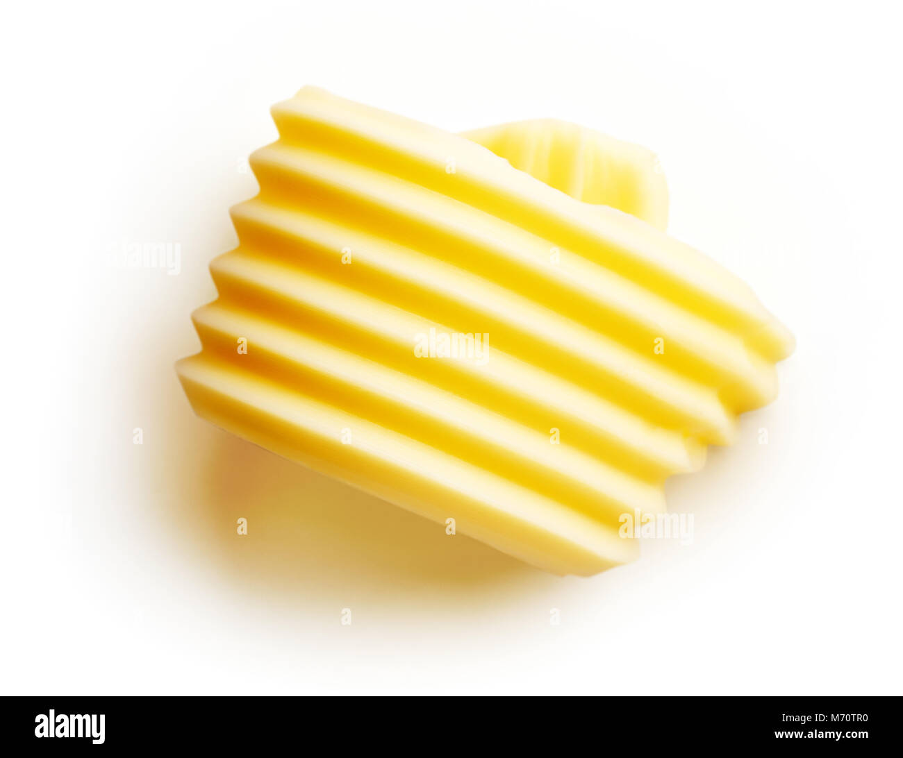 Fresh butter curl isolated on white background, top view Stock Photo ...