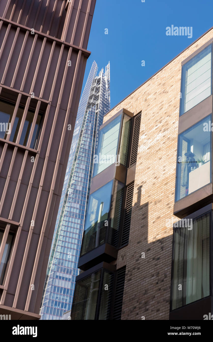 a different and unusual viewpoint or angle of the shard office building ...