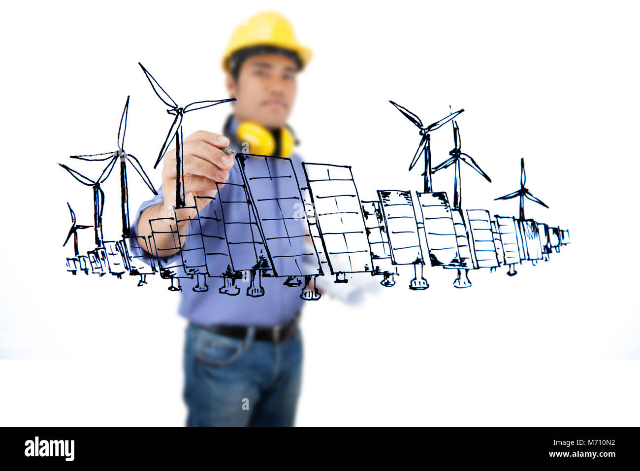 Engineer drawing renewable energy project Stock Photo - Alamy