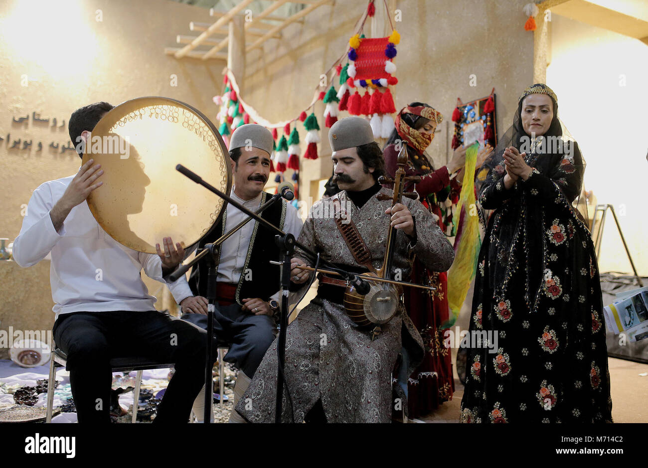 Tehran, Iran. 7th Mar, 2018. Iranian villagers wearing local costumes ...