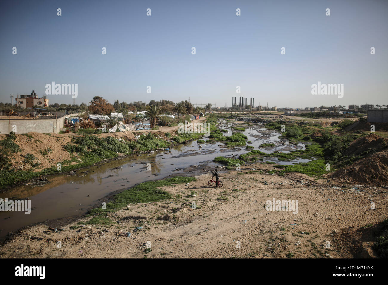 A general view of a lake of sewage close to the idled Gaza power plant ...