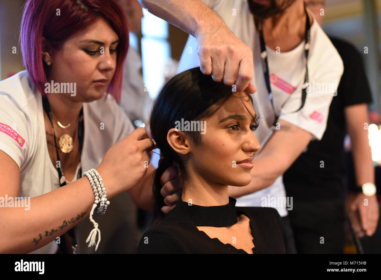 Model Hannah Wick prepares backstage for runway 3 at the Virgin ...
