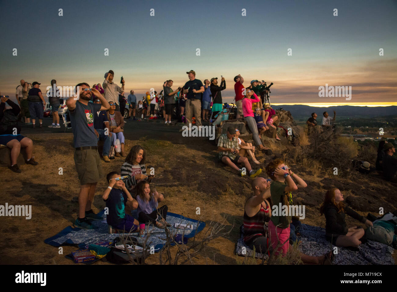 Madras, Oregon, USA. 21st Aug, 2017. People seen watching the total ...
