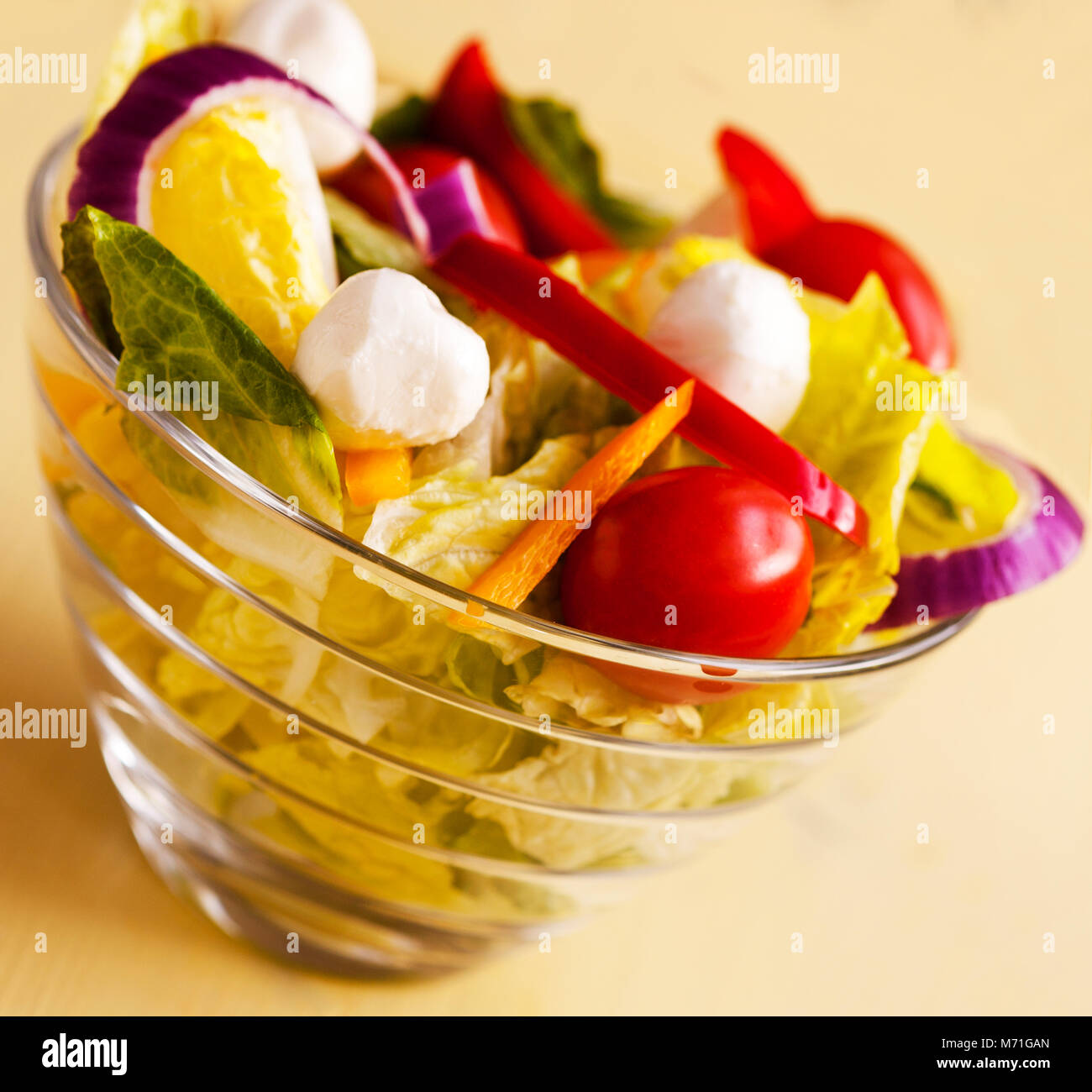 Macro view of fresh Spring Summer Salad in Glass Bowl Stock Photo - Alamy