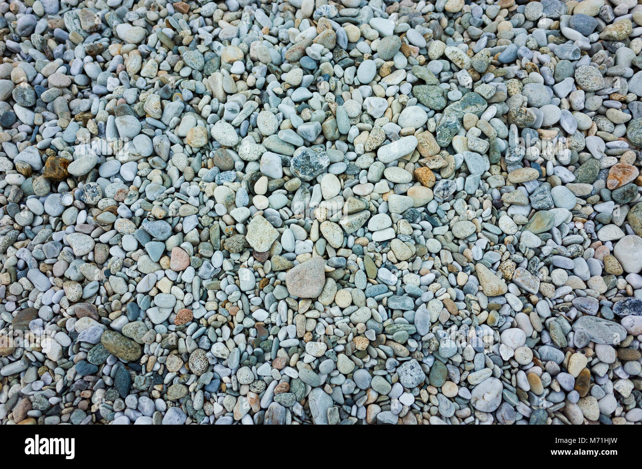 Texture of small ocean shore rocks and stones Stock Photo - Alamy