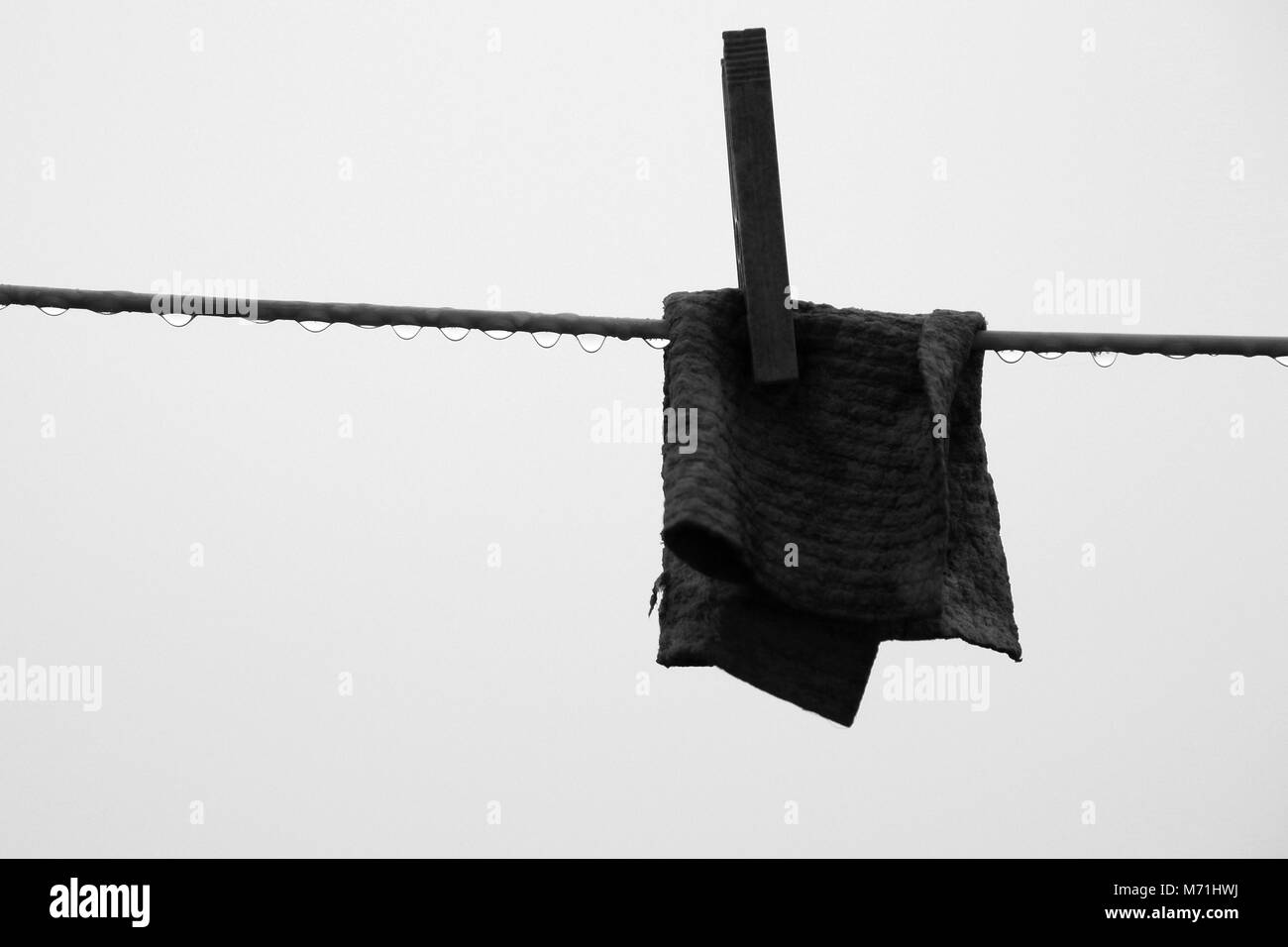 Water drops hanging from a rope Stock Photo - Alamy