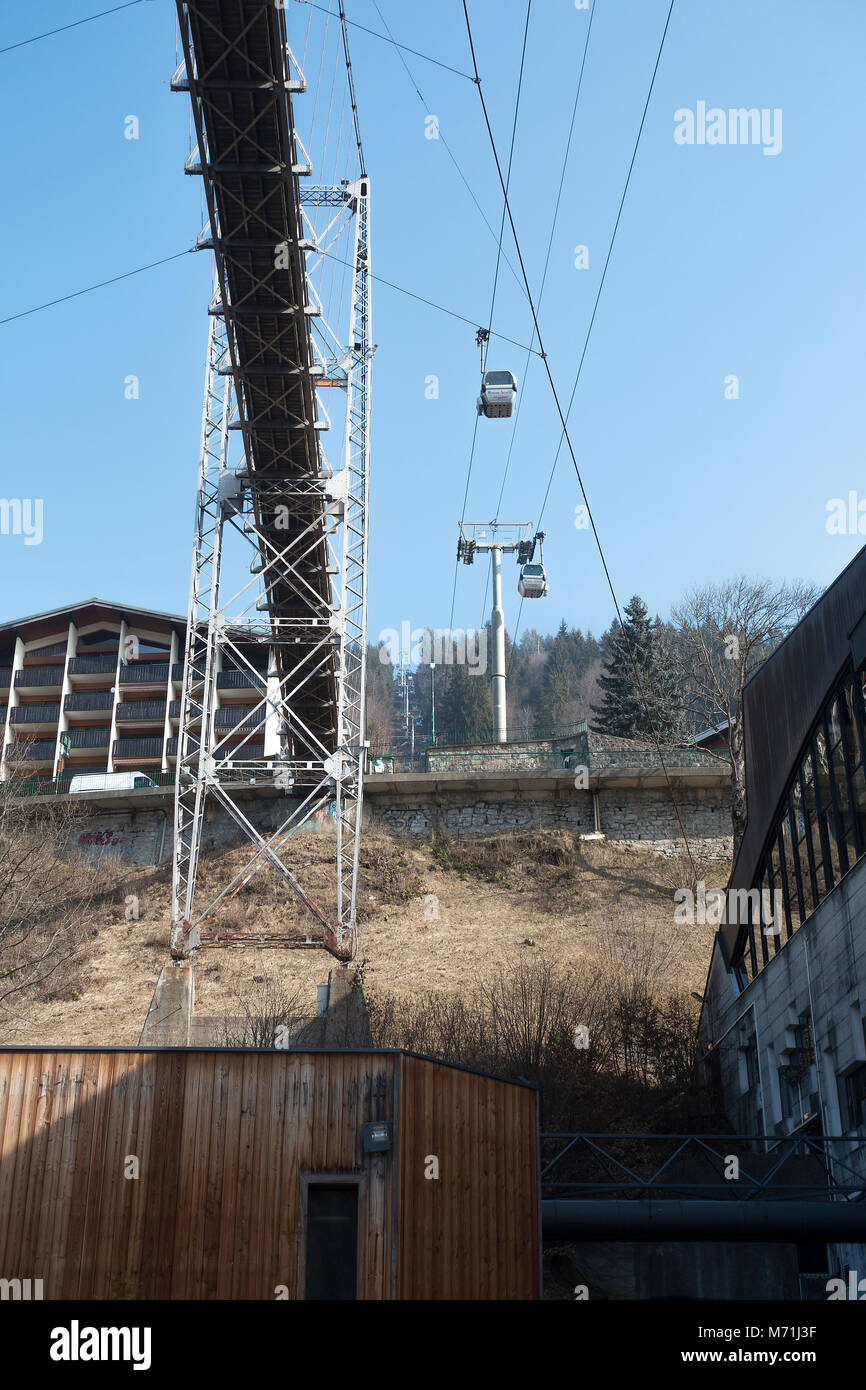 A Gondola Running Alongside a Suspension Bridge Walkway in the Ski ...