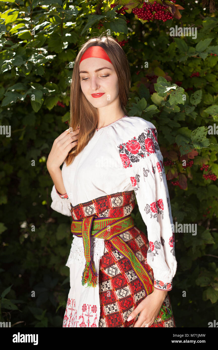 Beautiful Ukrainian girl with long hair in national clothes embroidered ...